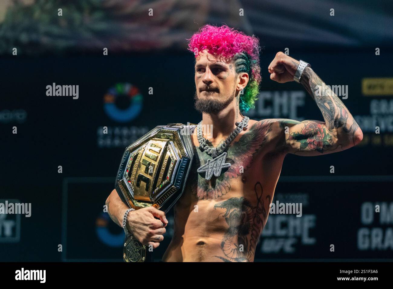 Sean O'Malley flexing muscles on stage during the UFC 306 at Riyadh ...