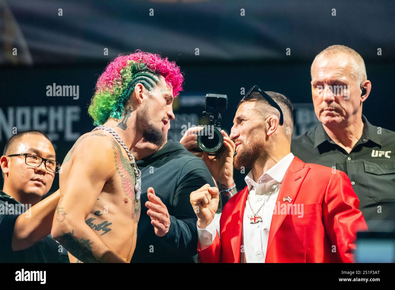 Opponents Sean O'Malley and Merab Dvalishvili of Georgia face off ...