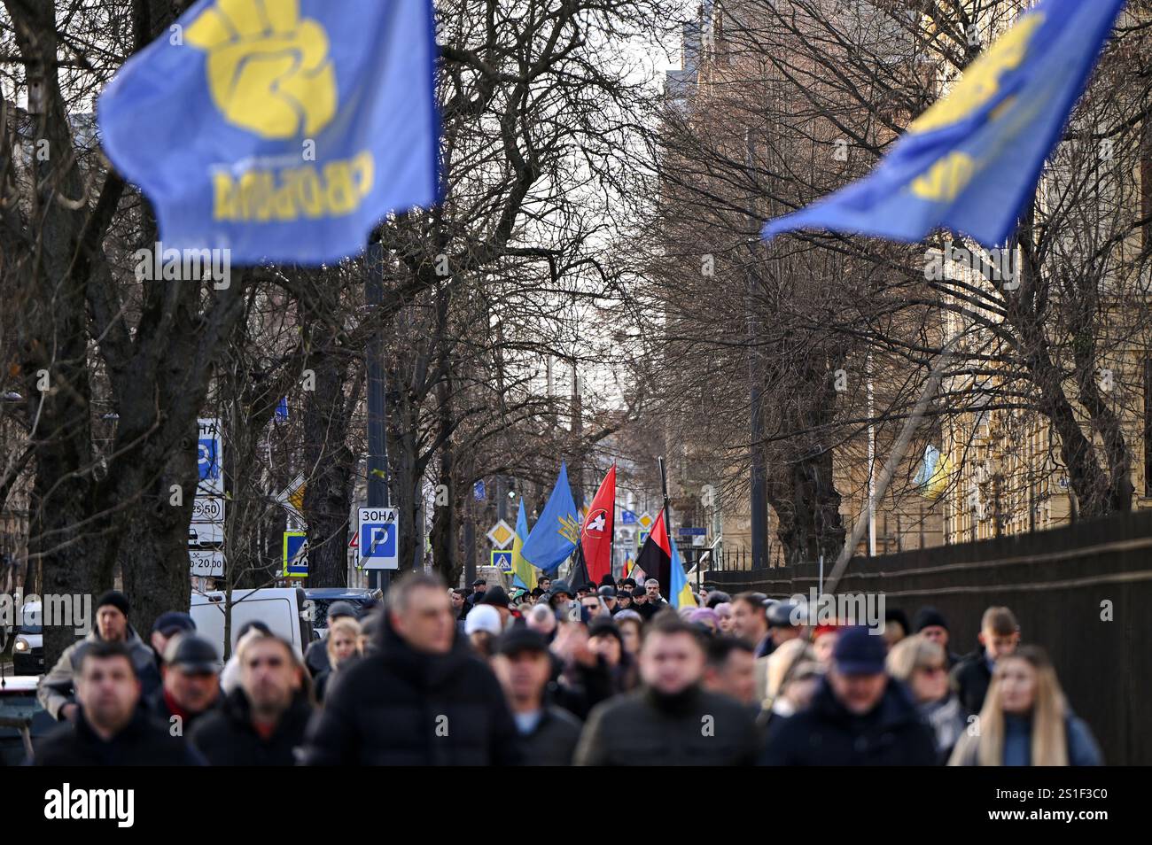LVIV, UKRAINE - JANUARY 1, 2025 - People walk from the Stepan Bandera ...