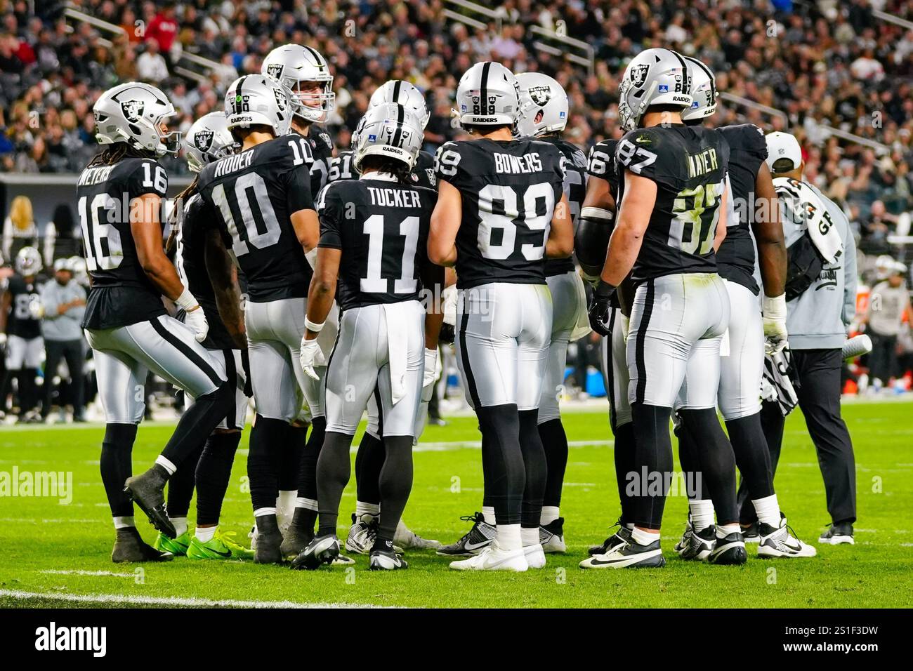 The Las Vegas Raiders huddle on offense during the first half against ...