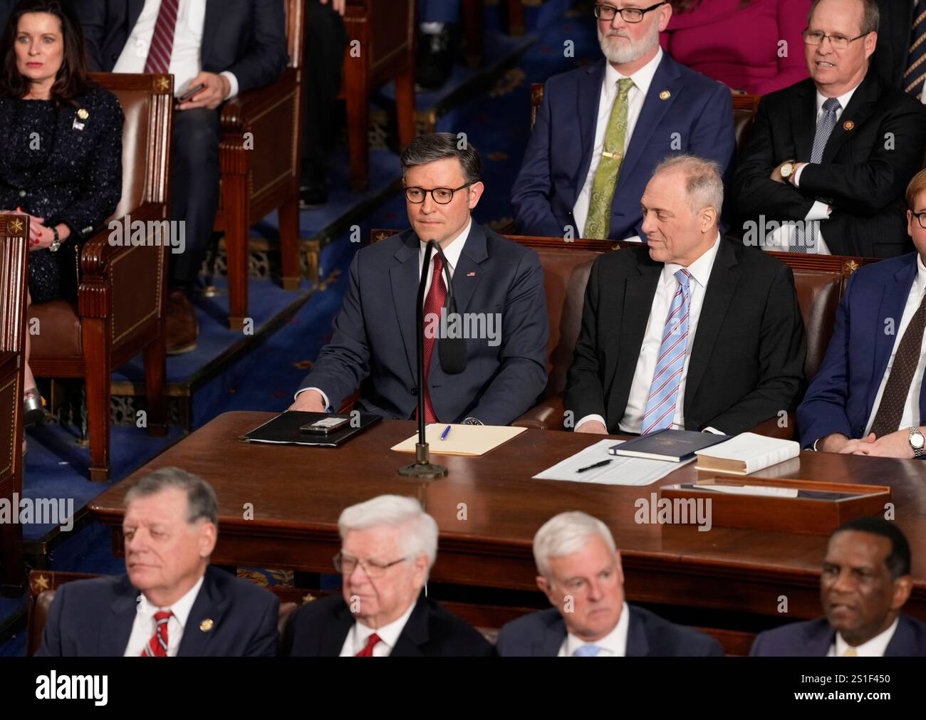 Speaker of the House Mike Johnson listens as his name is put into ...
