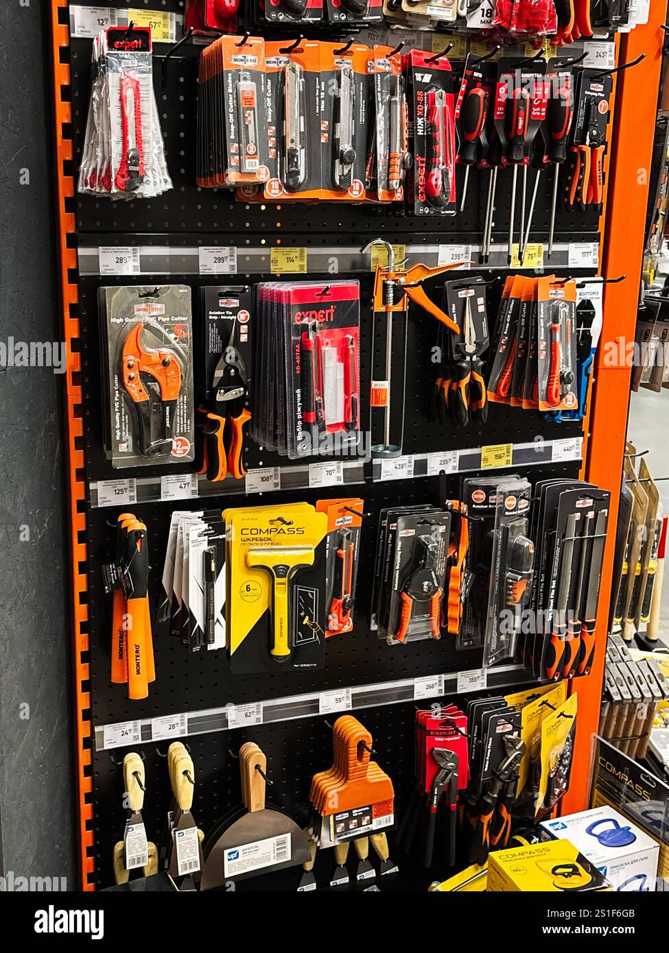 Kyiv, Ukraine - January 03, 2025: Hardware tools meticulously arranged on shelves showcasing ...