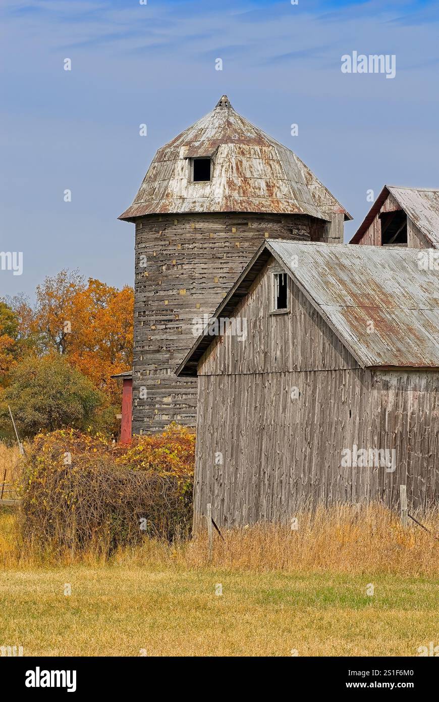 Weathered old farm buildings with hay silo in thousand island region of ...