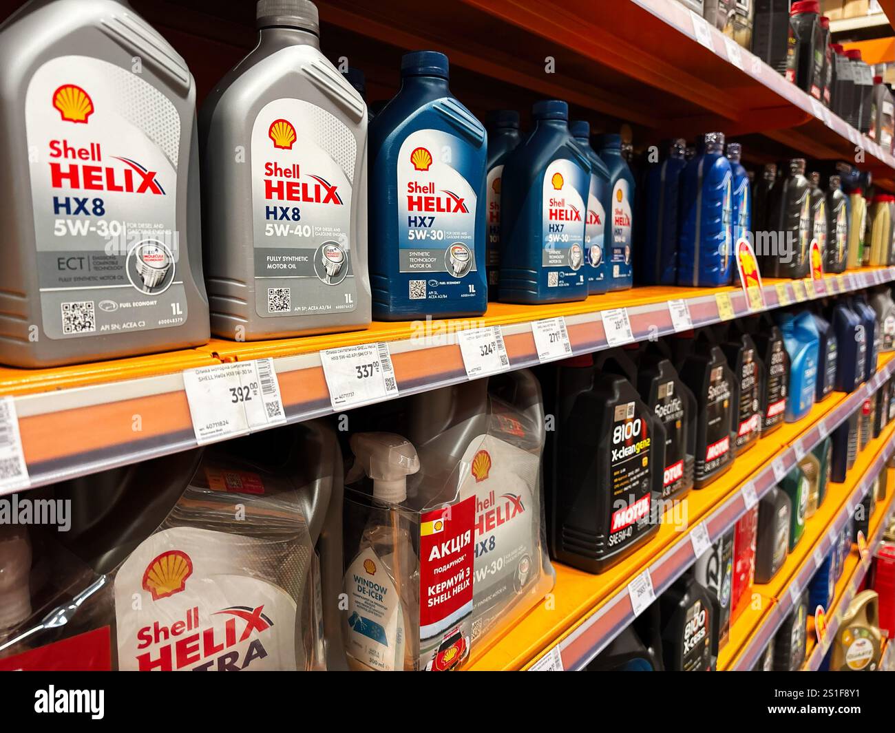 Kyiv, Ukraine - January 03, 2025: Organized rows of motor oil ...