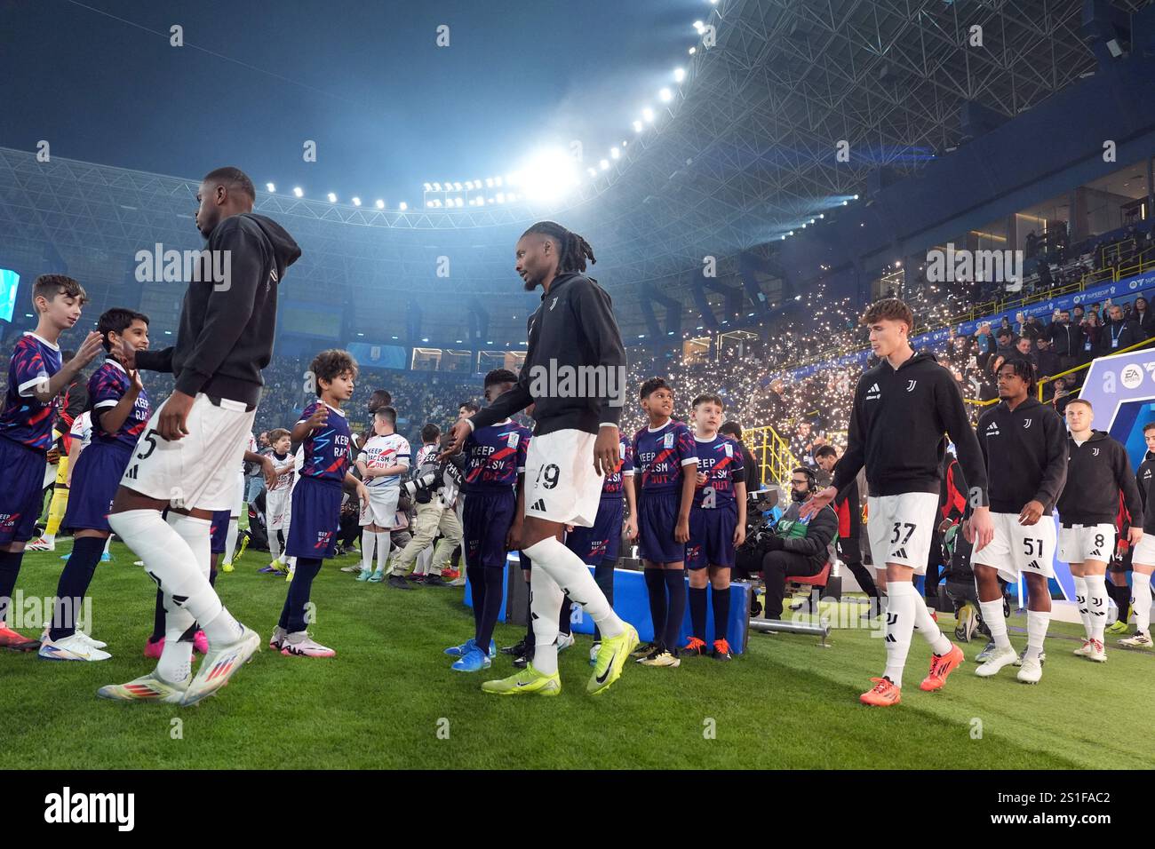 Riyadh, Saudi Arabia. 03rd Jan, 2025. Teams enter the soccer turf for ...