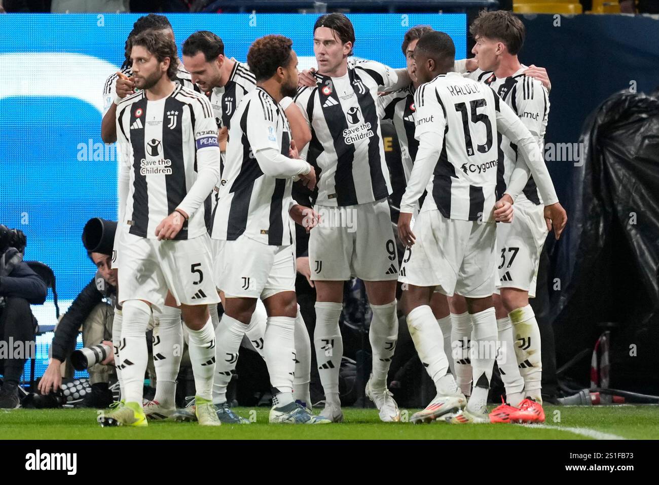 Juventus players celebrate after a goal during the Italian Super Cup ...