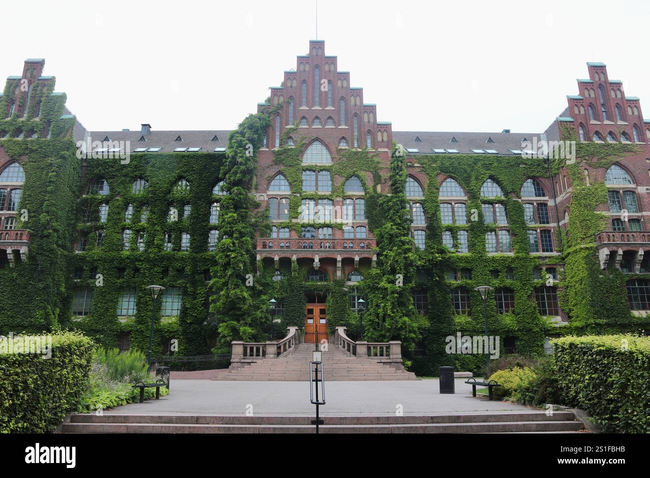 The building of the University Library in Lund, Sweden. Ivy-covered red ...