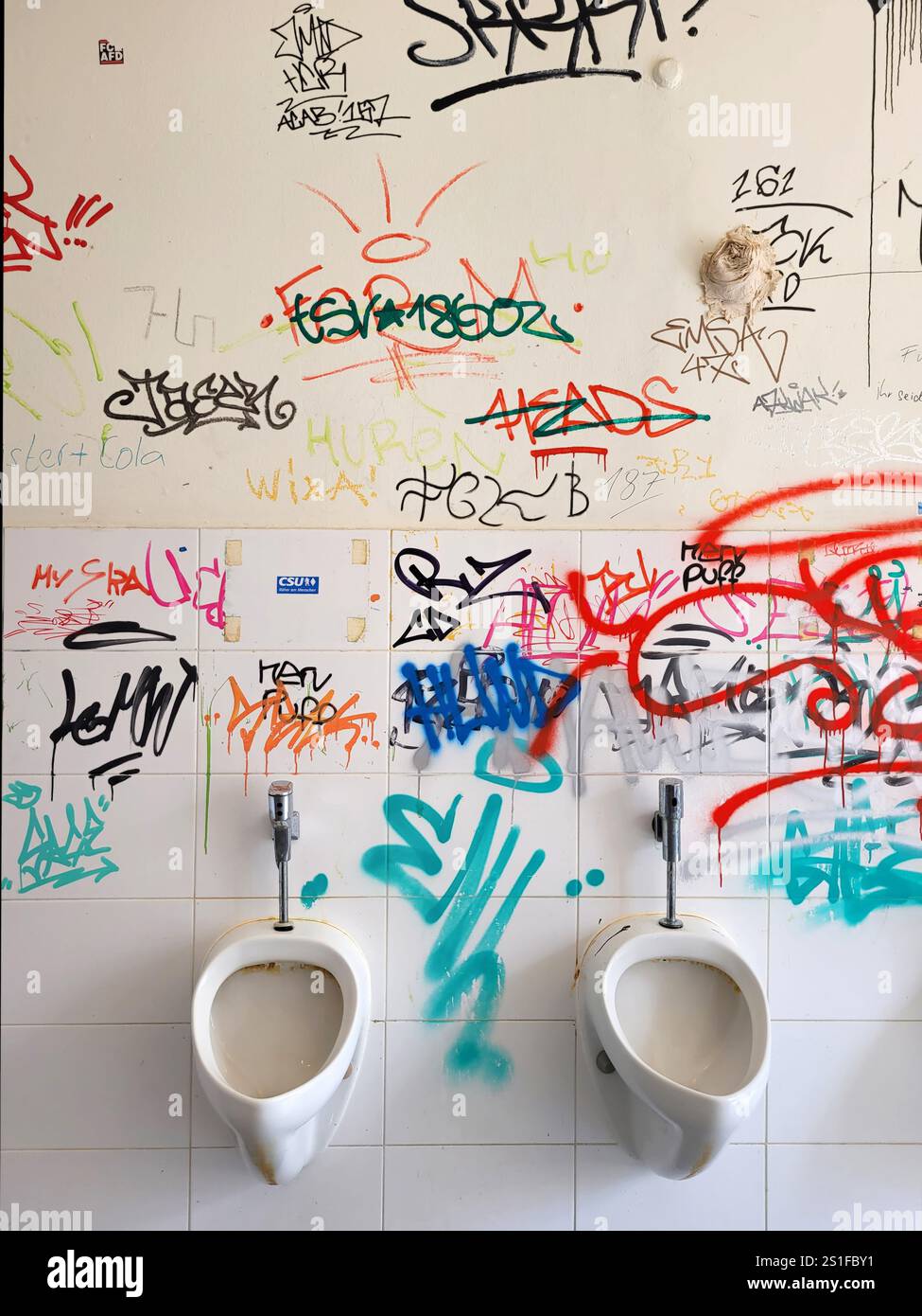 Graffiti in a men s urinal, public toilet Stock Photo - Alamy