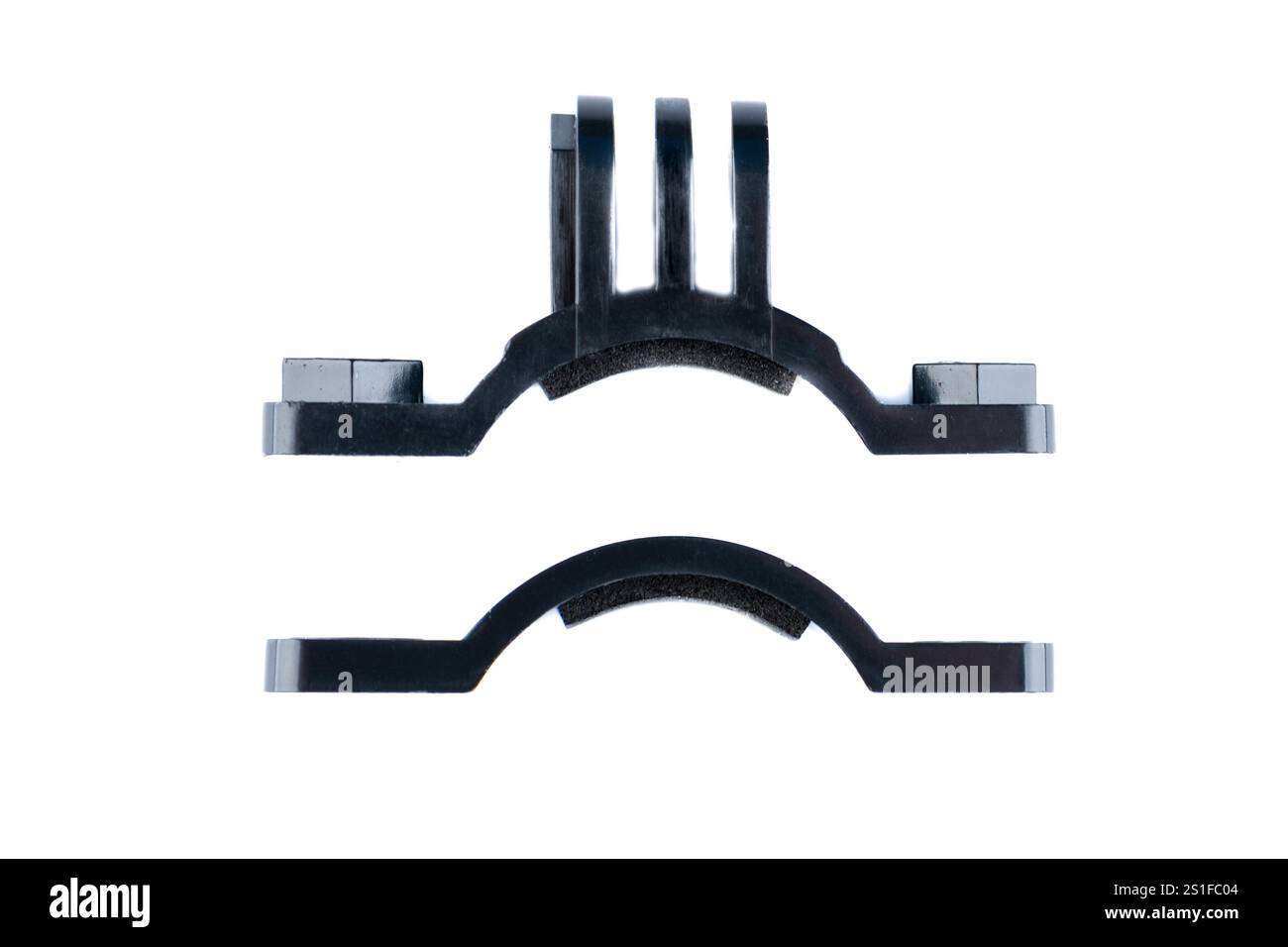 Close-up image of black plastic mounting brackets with foam padding ...