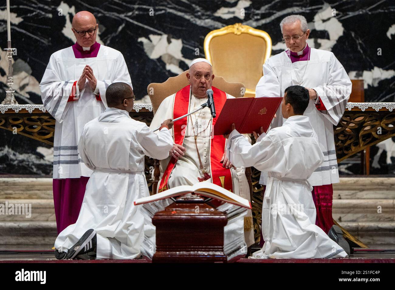 Pope Francis prays in front of the coffin during the funeral for the ...