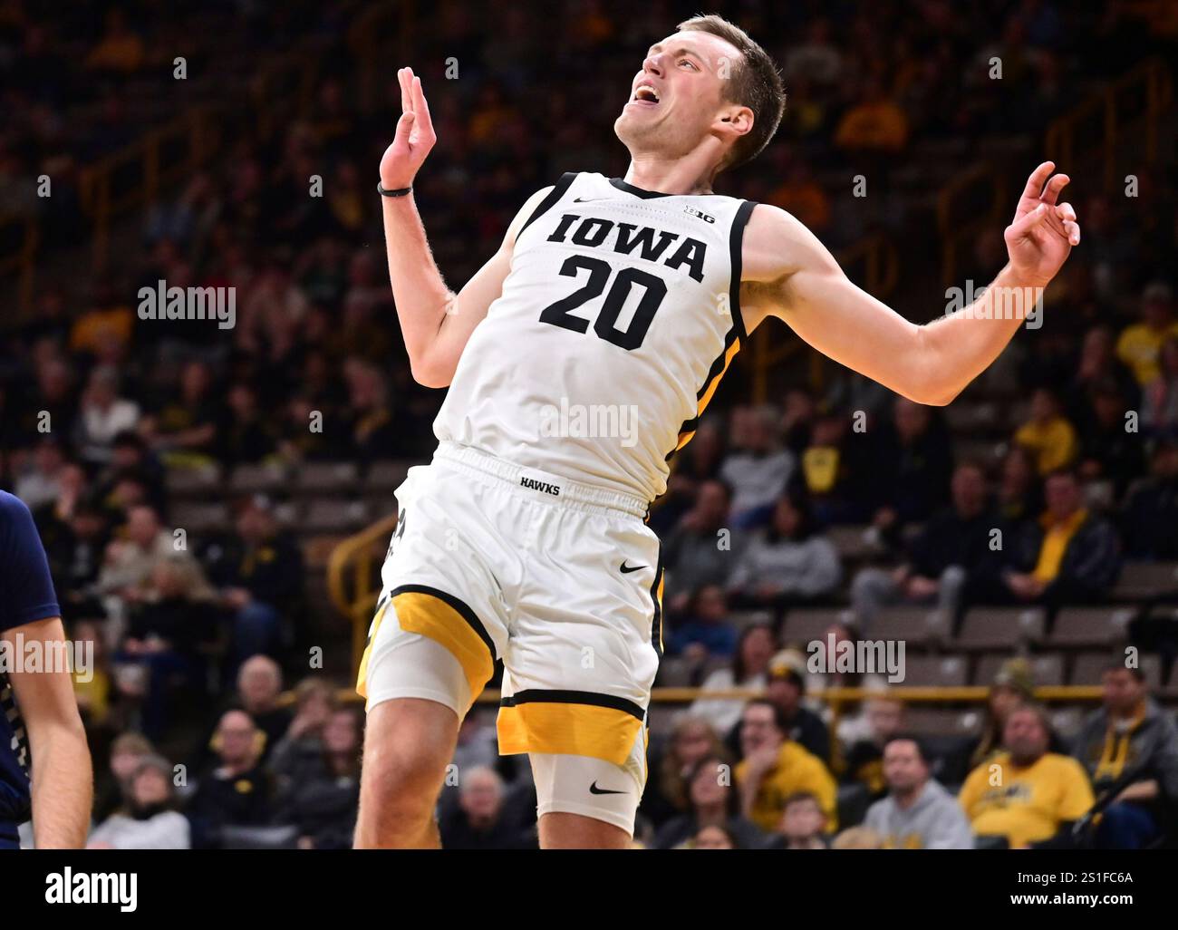 IOWA CITY, IA - DECEMBER 30: Iowa forward Payton Sandfort (20) reacts ...