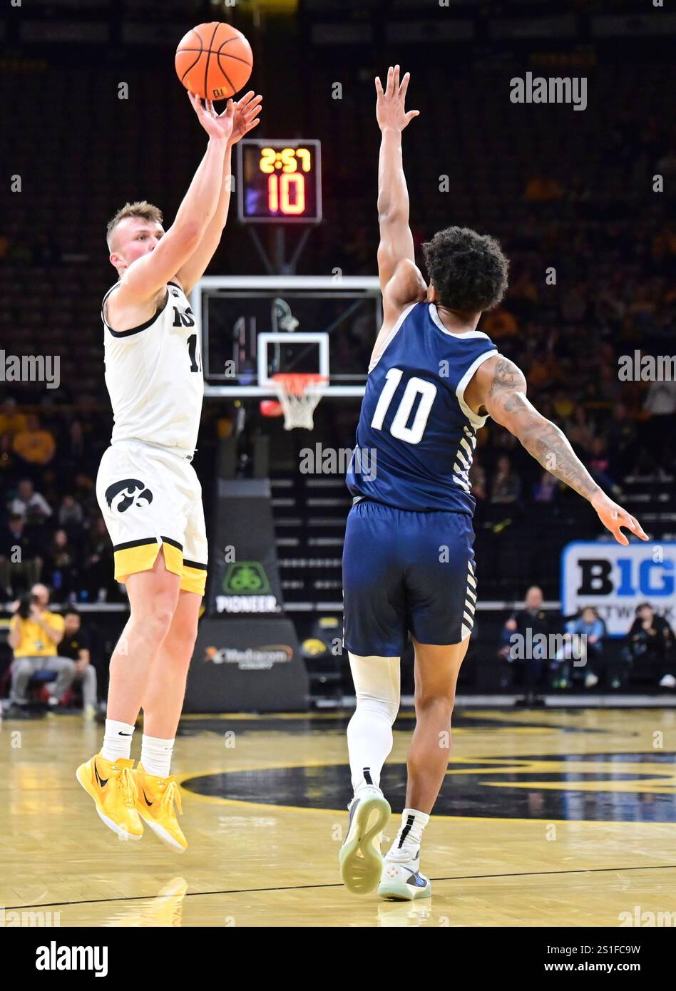 IOWA CITY, IA - DECEMBER 30: Iowa guard Carter Kingsbury (14) shoots ...