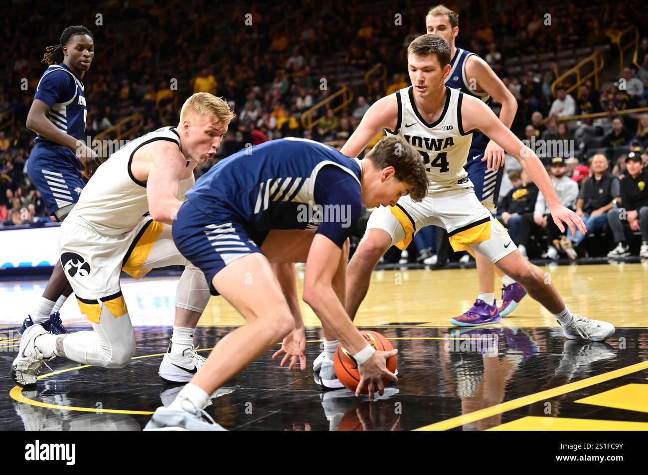 IOWA CITY, IA - DECEMBER 30: New Hampshire center Caleb Middleton (5 ...