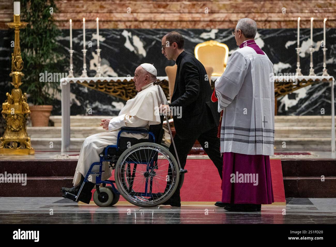 Pope Francis leaves the St. Peter's Basilica after the funeral for the ...