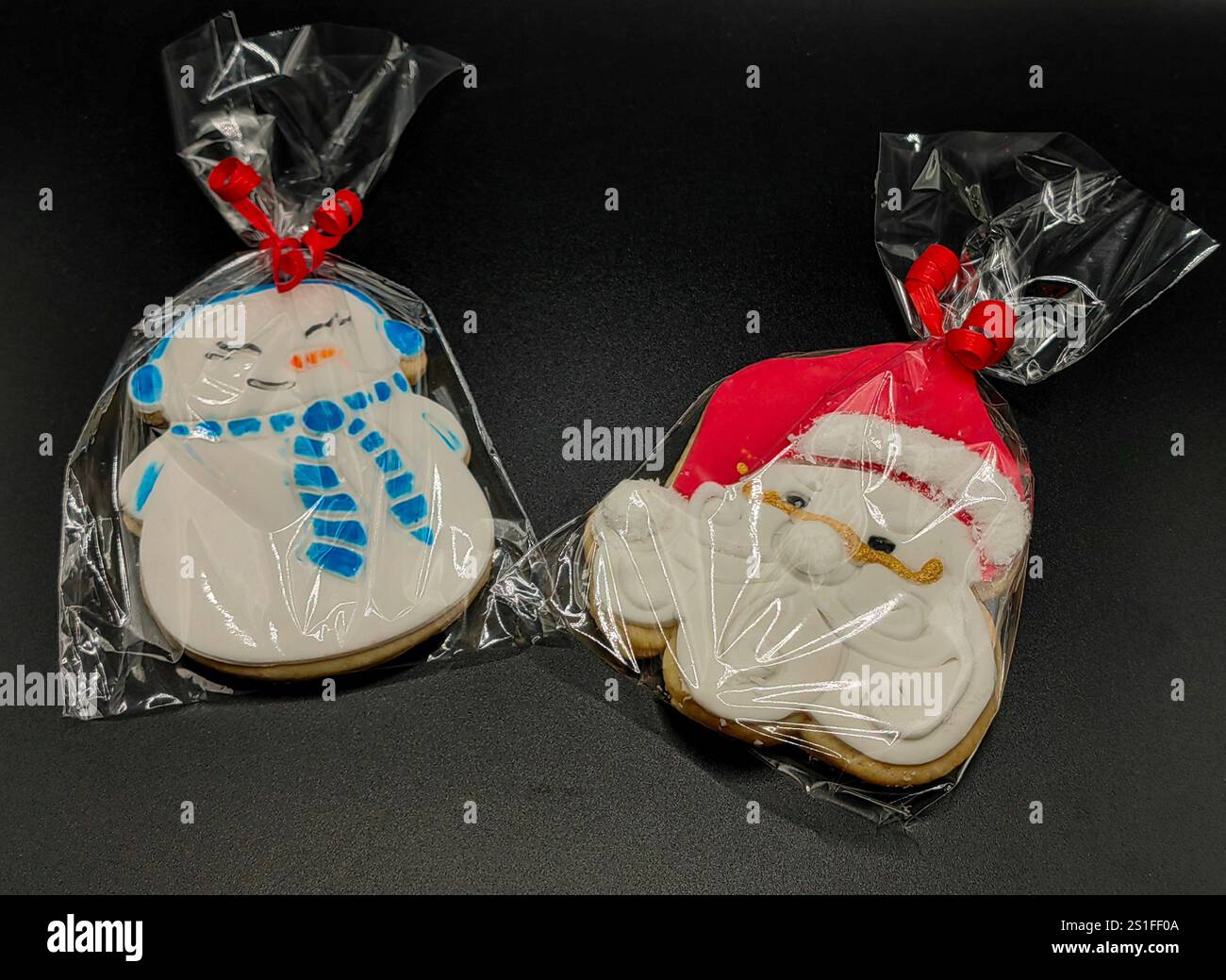 Sweet Holiday Treats: Snowman and Santa Claus 2025 Edition Stock Photo ...