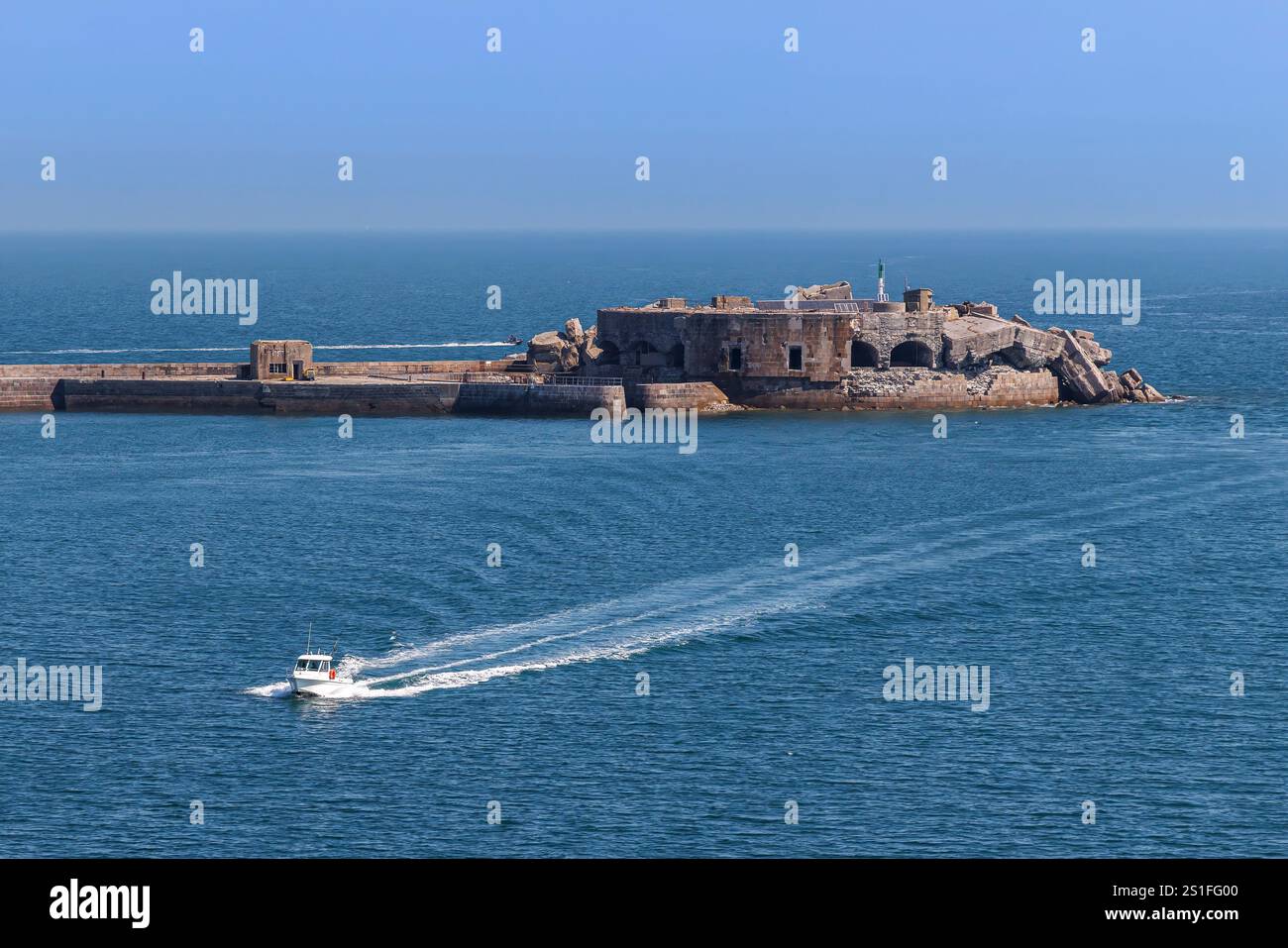 Pilot boat and coastal wartime defences at the port of Cherbourg ...