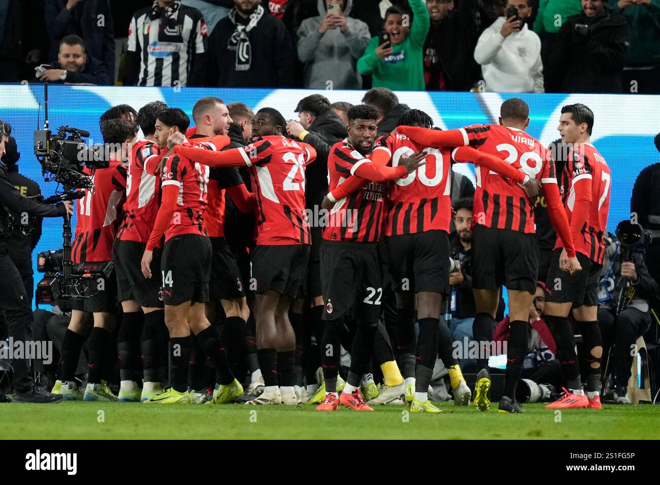 AC Milan players celebrate after scoring during the Italian Super Cup ...