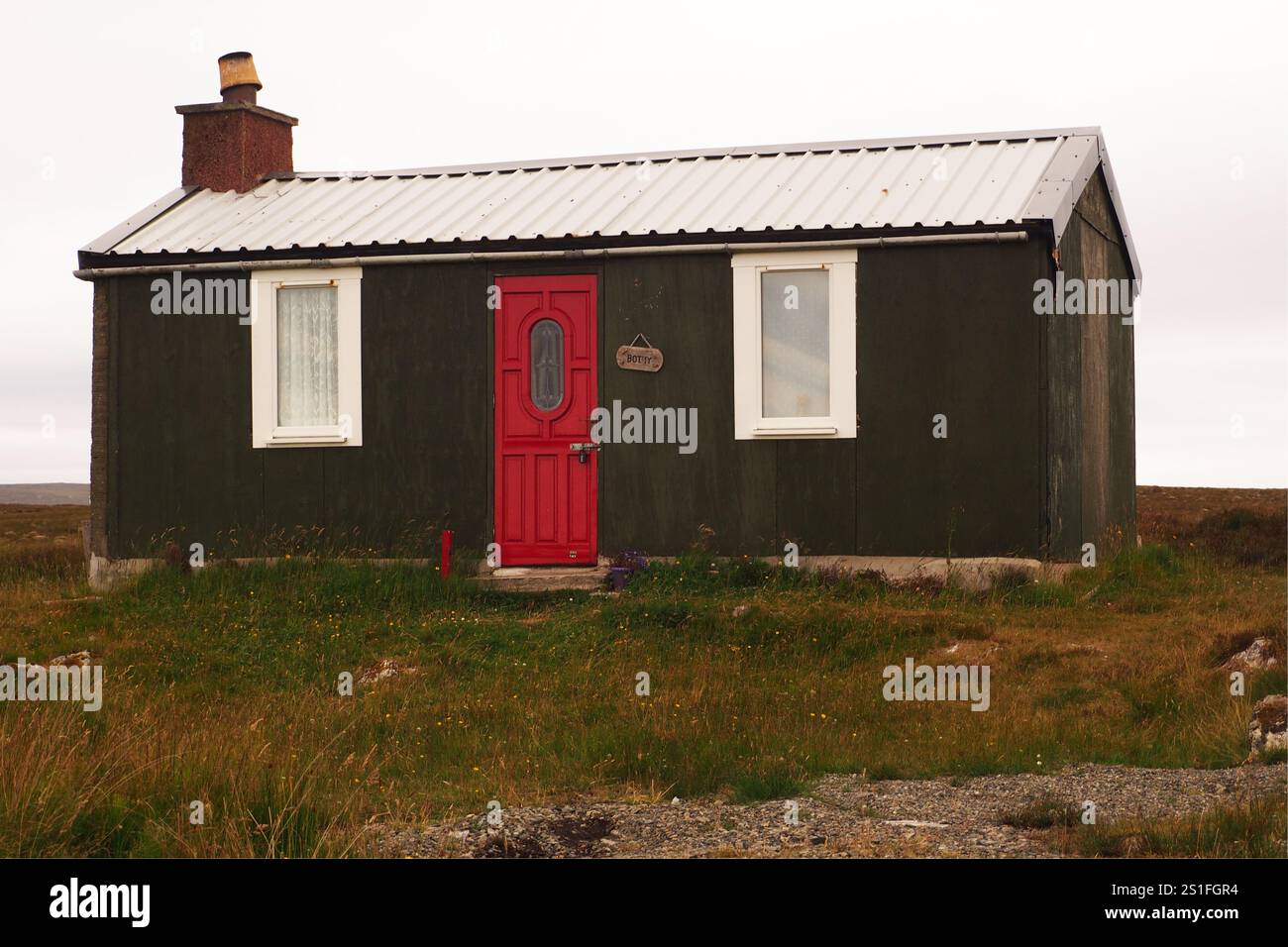 A Scottish bothy in a remote landscape on the Isle of Lewis, showing ...