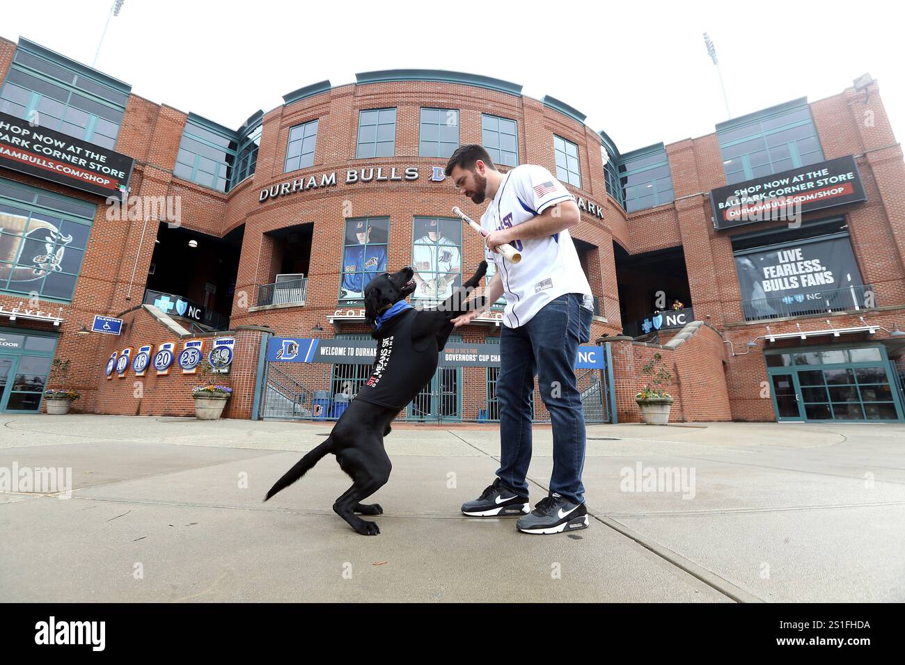 Durham, North Carolina, USA. 3rd Jan, 2025. Ripken the Bat Dog and ...