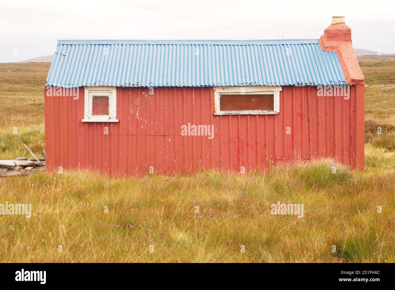 A Scottish bothy in a remote landscape on the Isle of Lewis, showing ...