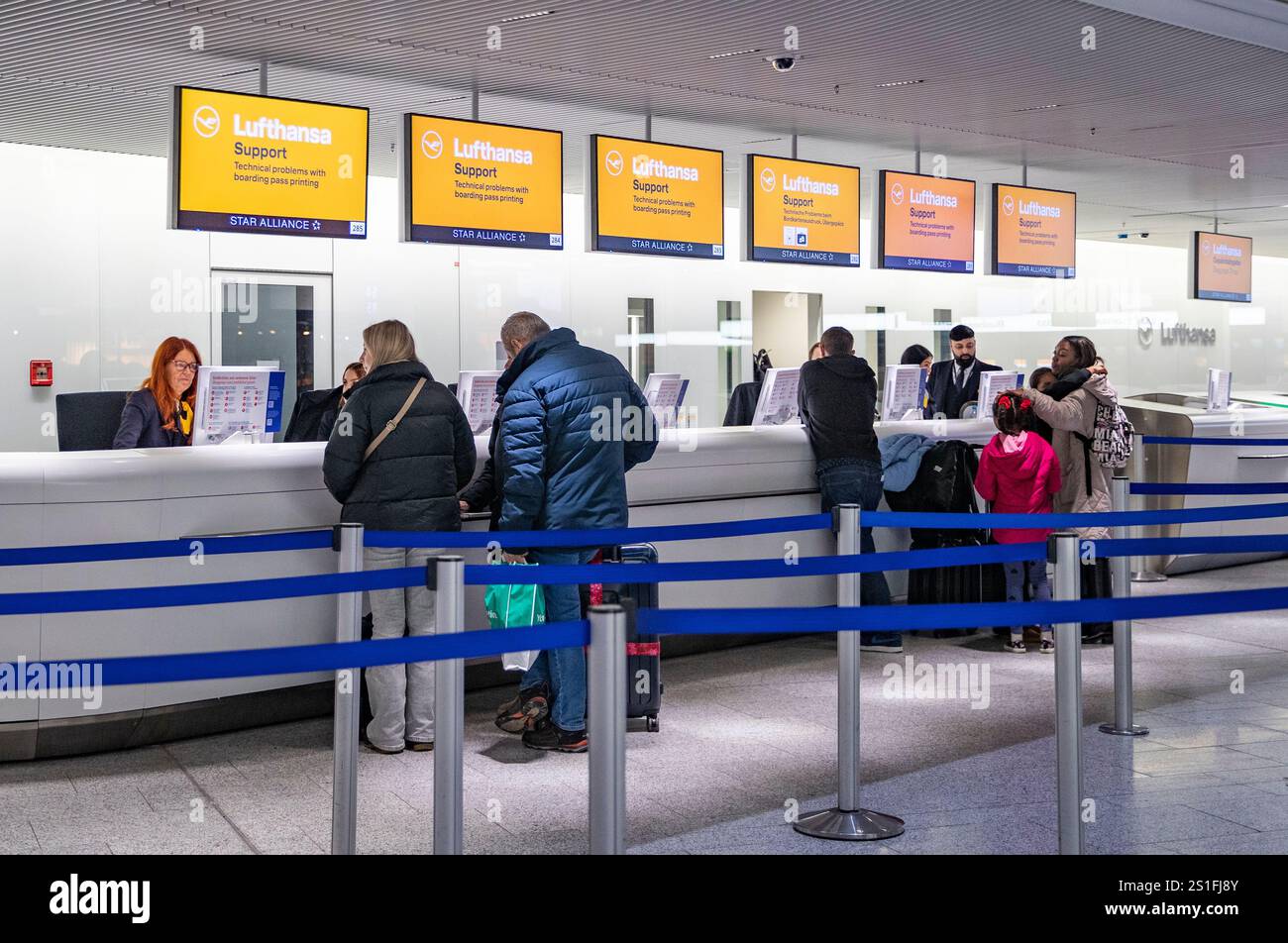 Frankfurt, Germany. 3rd Jan, 2025. Passengers are seen at a Lufthansa's ...