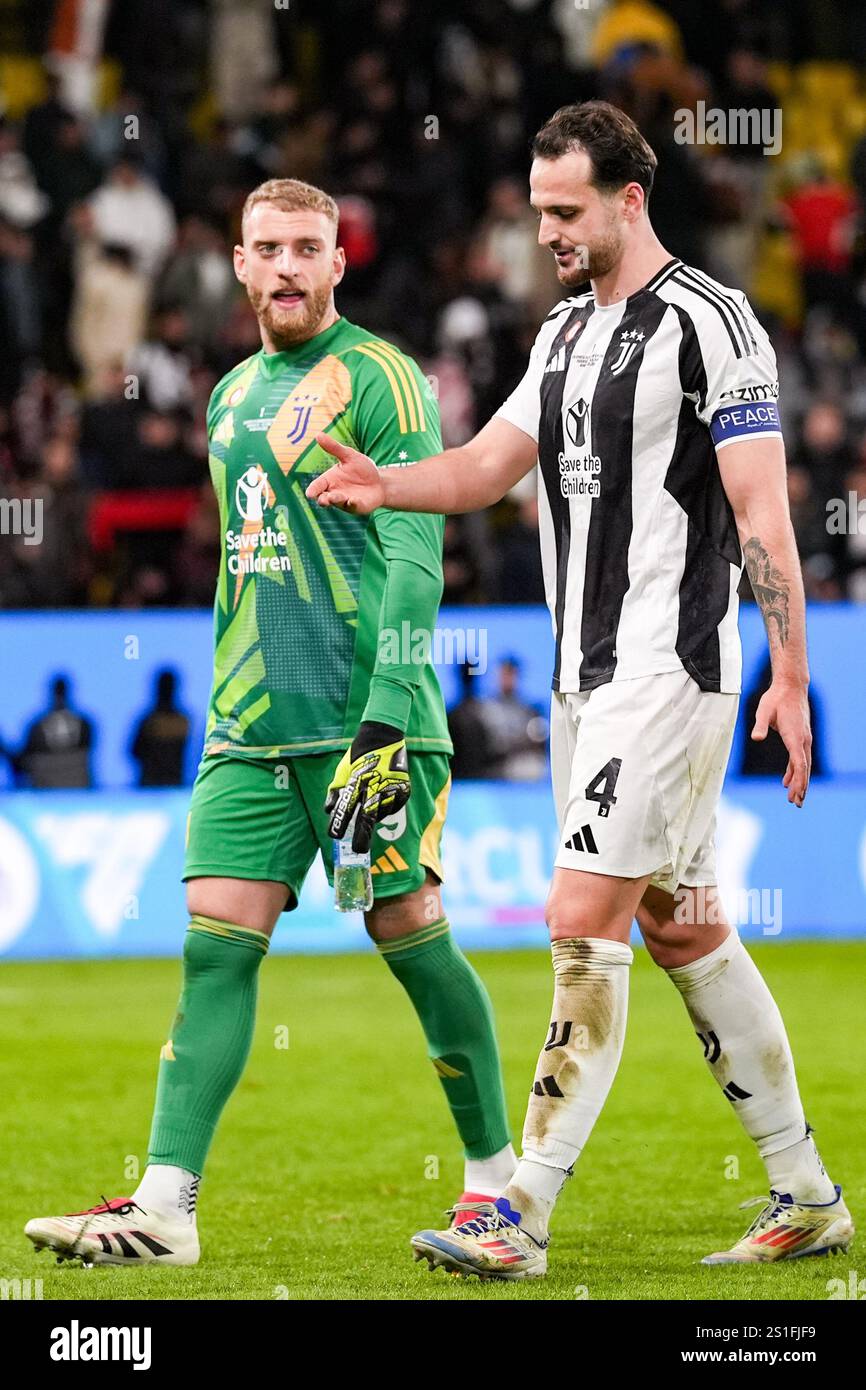 Juventus' goalkeeper Michele Di Gregorio and Juventus' Federico Gatti ...