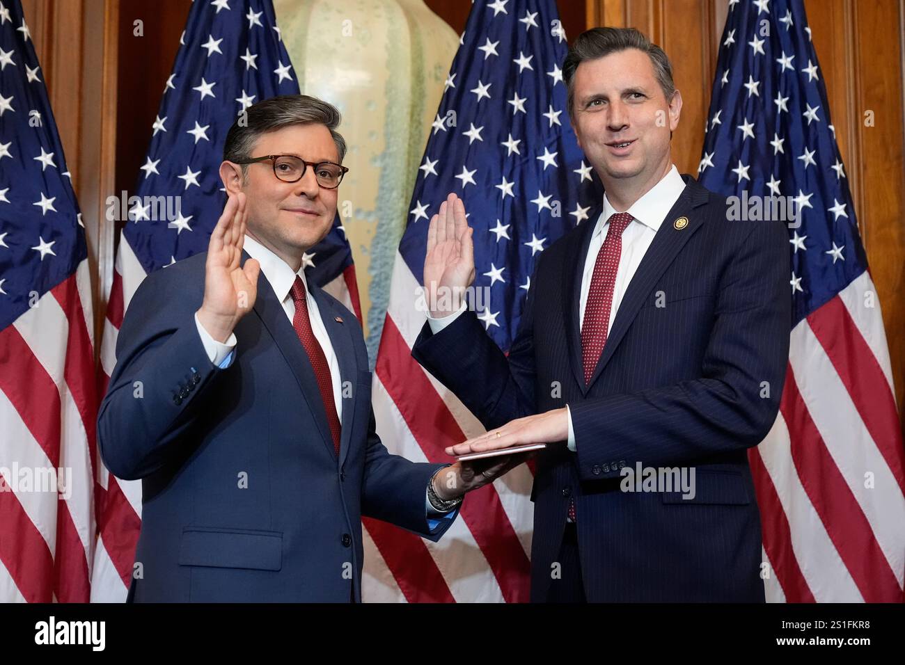 House Speaker Mike Johnson, R-La., left, poses during a ceremonial ...