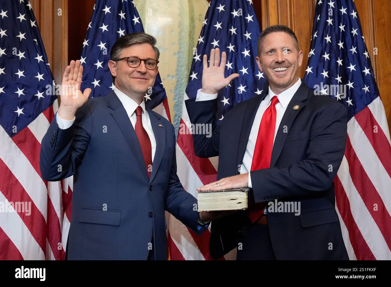 House Speaker Mike Johnson, R-La., left, poses during a ceremonial ...