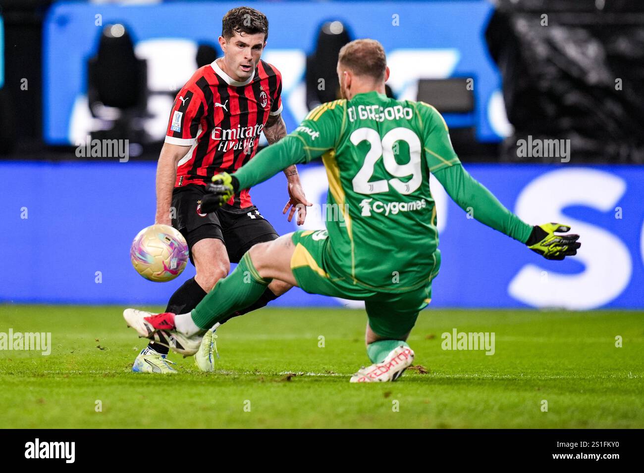Juventus’ goalkeeper Michele Di Gregorio and Milan’s Christian Pulisic ...