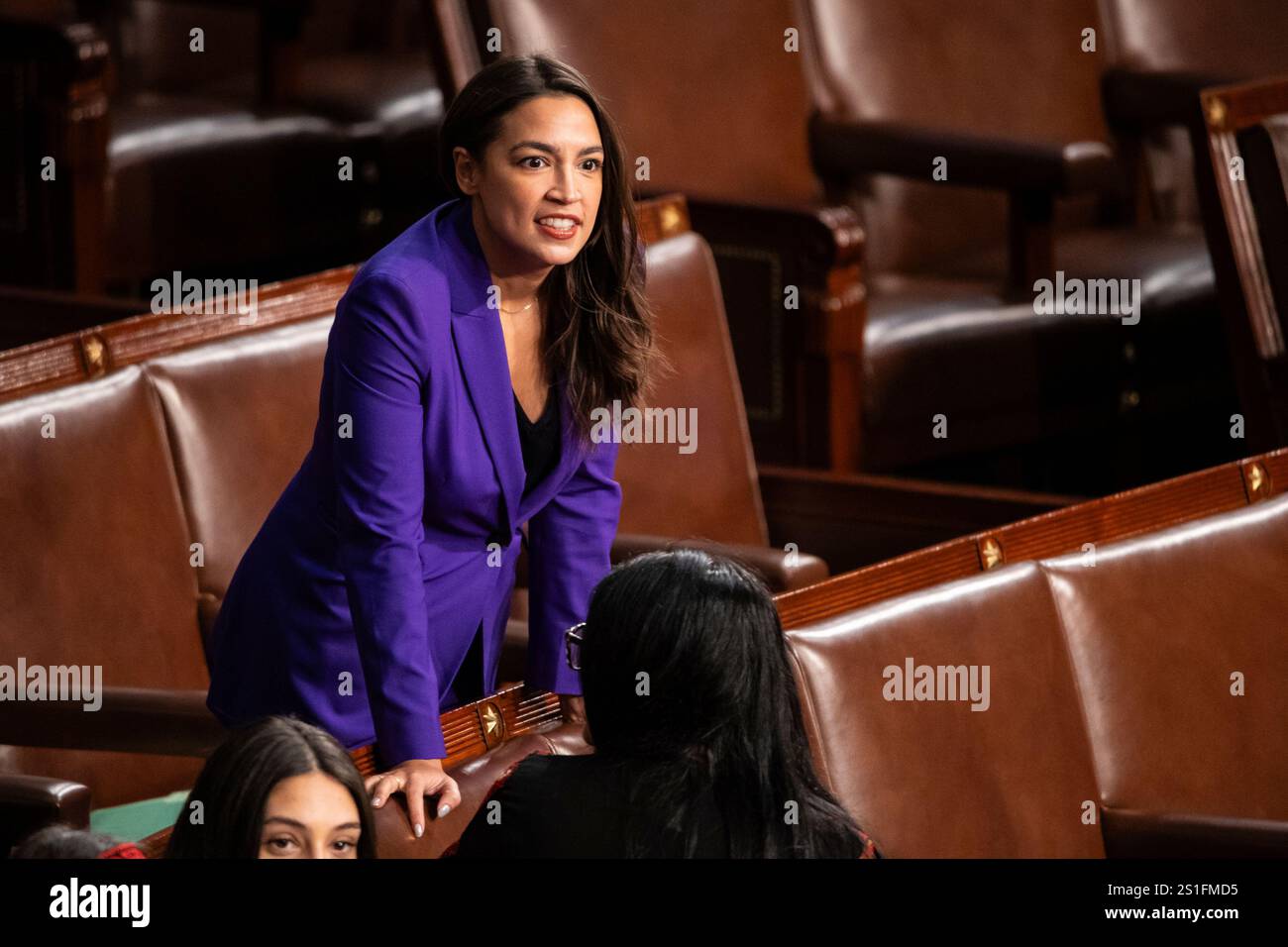 Rep. Alexandria Ocasio-Cortez (D-N.Y.) is seen in the House chamber at ...
