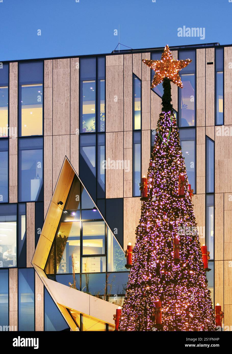 Christmas tree in front of the modern facade of the Koe-Bogen by ...