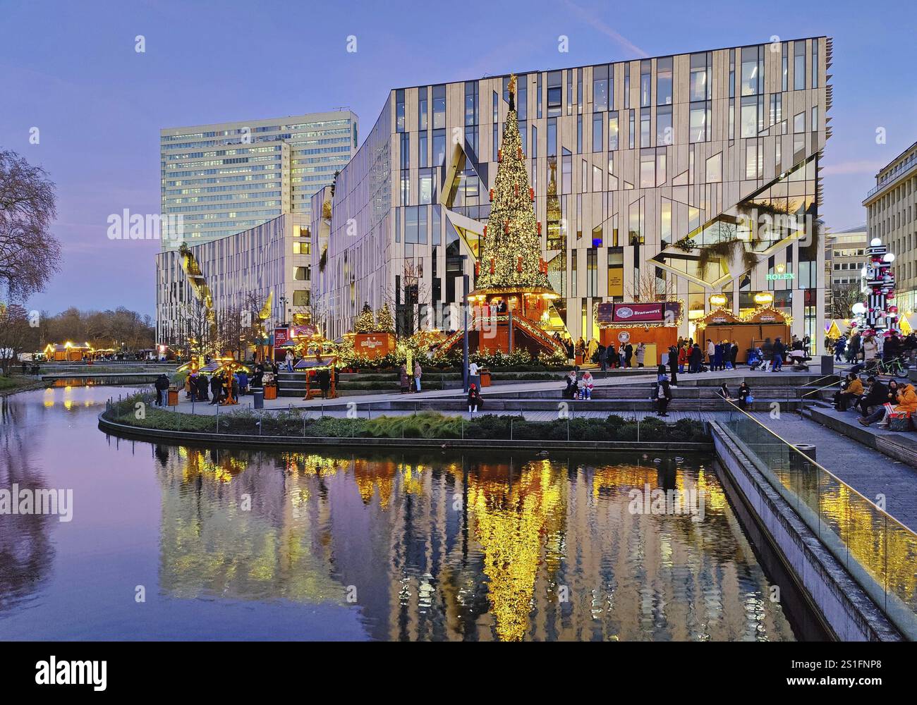 Dreischeibenhaus and Christmas market in front of the Koe-Bogen by ...