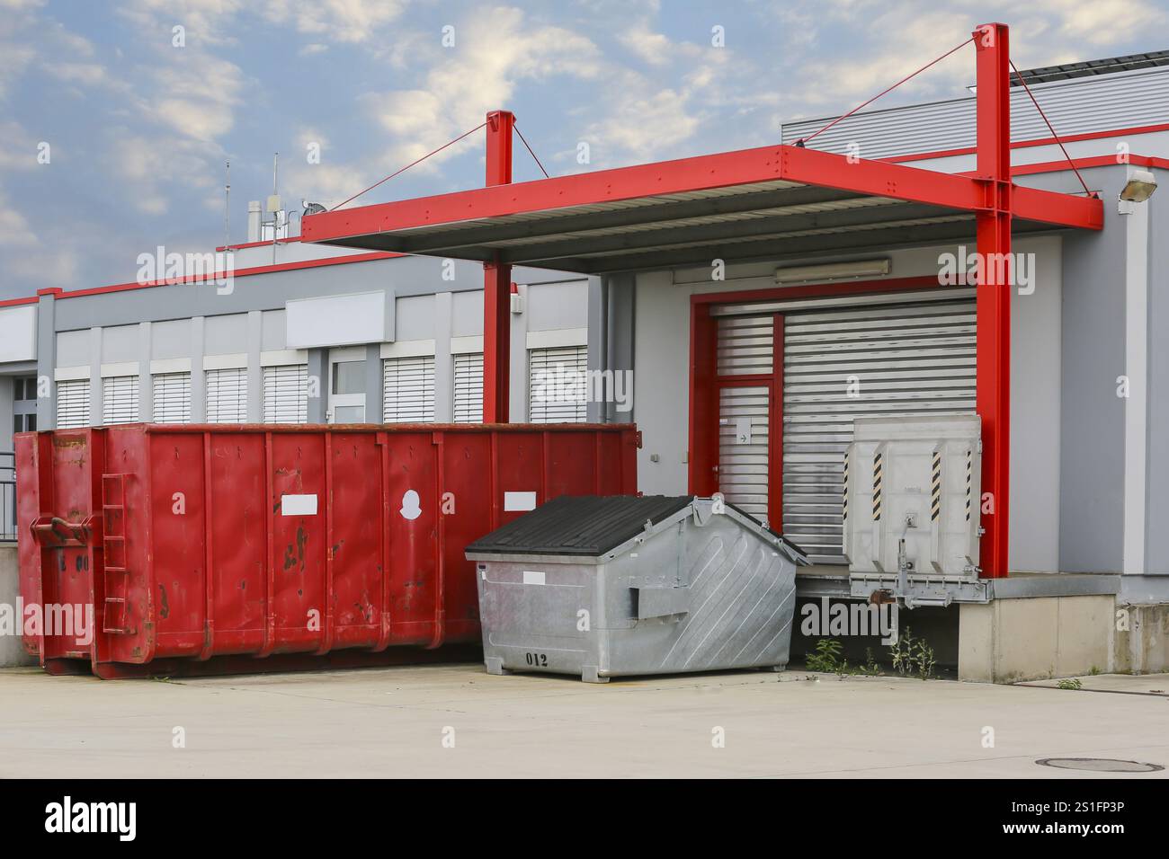Roller shutters in a goods receiving area of a warehouse building Stock ...