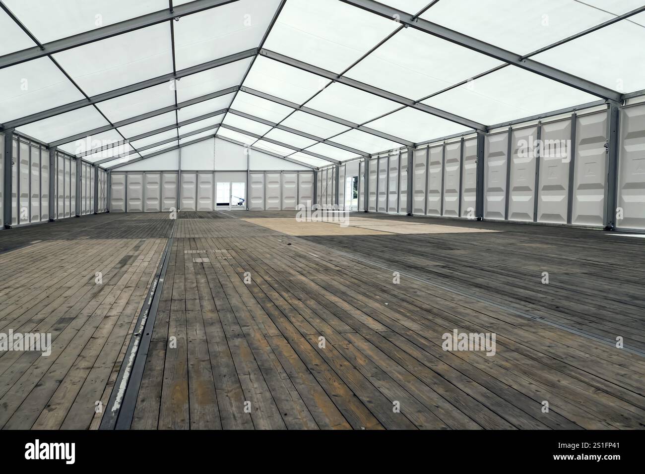 Empty exhibition tent from inside with wooden floor Stock Photo - Alamy