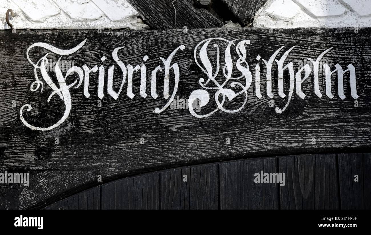 Friedrich Wilhelm ? Hand-painted white letters in Fraktur script on a ...
