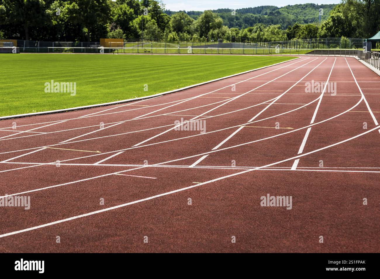Cinder track in detail in a stadium in summer Stock Photo - Alamy