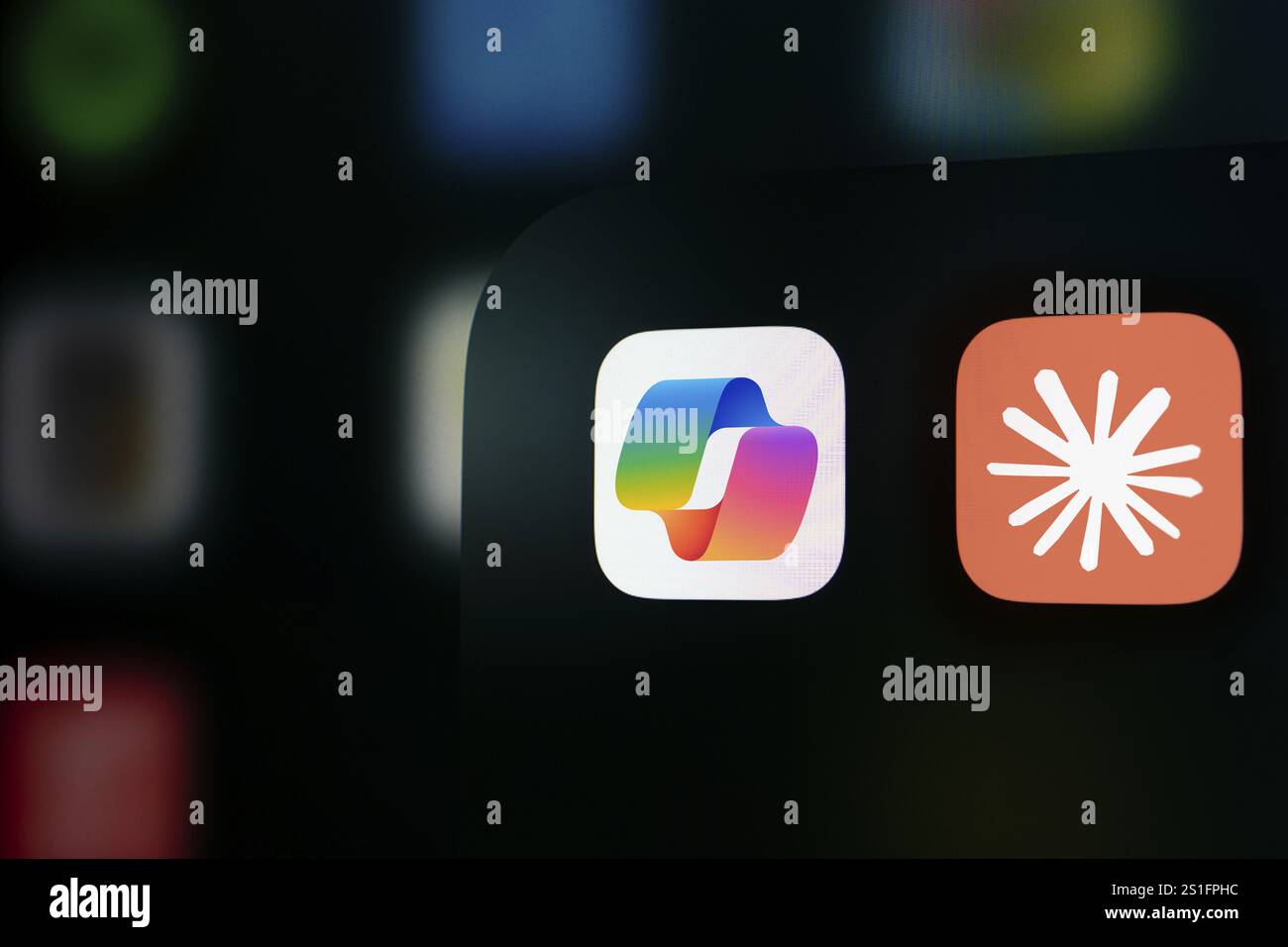 A close up of an iPhone screen displaying the Microsoft Copilot and ...