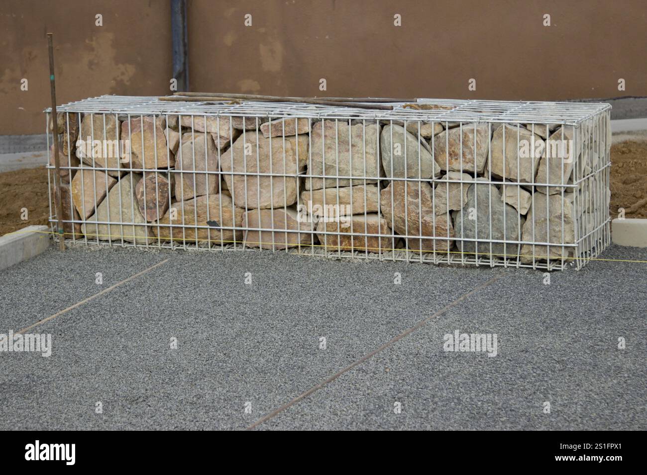 Gabion construction in a new park Stock Photo - Alamy