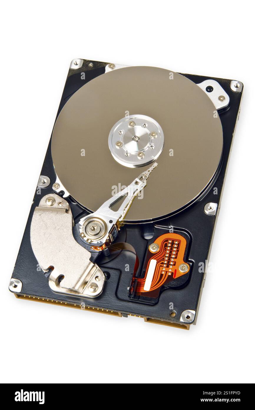 The inside of a hard disc drive on a light background Stock Photo - Alamy