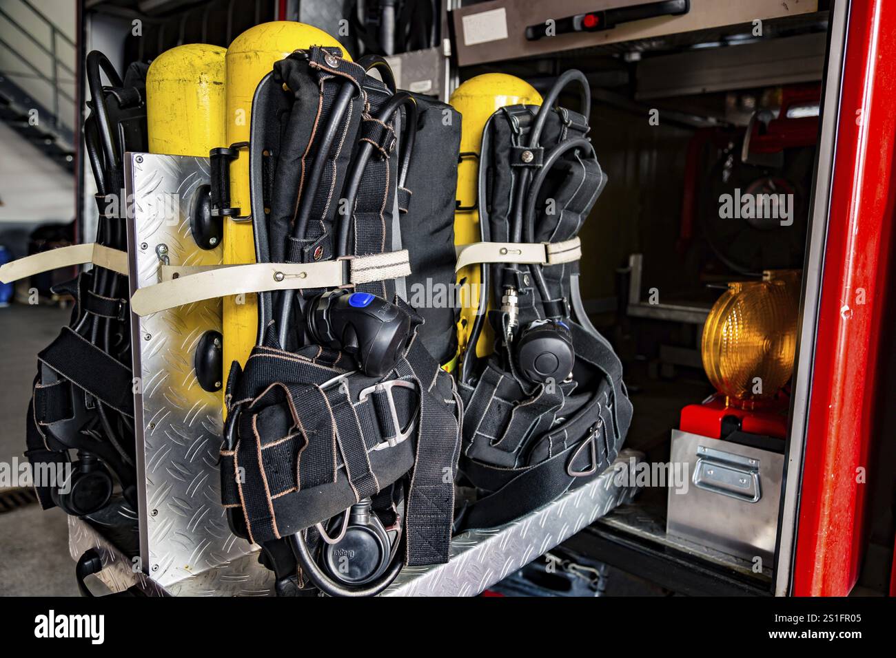 Oxygen cylinders in rack on fire engine Stock Photo - Alamy