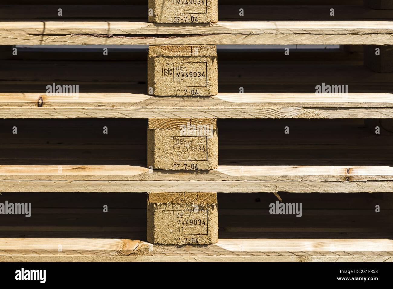 Stacked euro pallets with markings in detail Stock Photo - Alamy