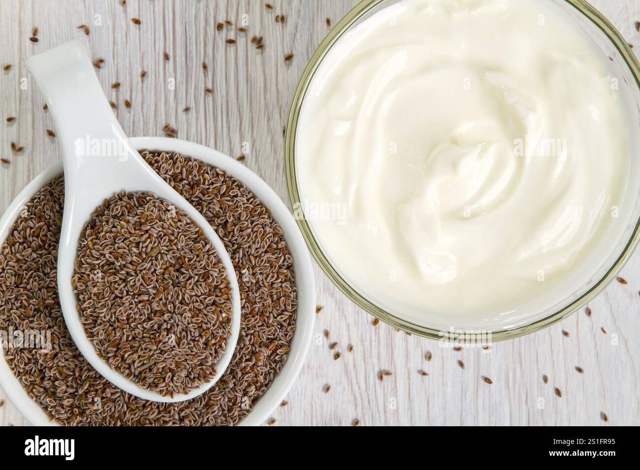Indian psyllium in detail with natural yoghurt Stock Photo - Alamy