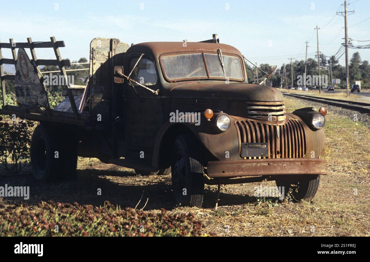 Old rickety lorry as an eye-catcher for a roadside farm, California ...