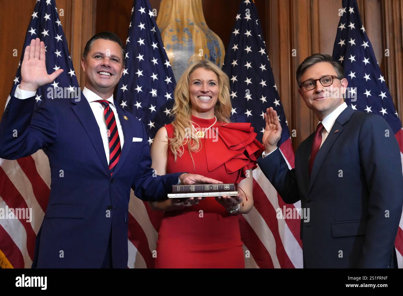 House Speaker Mike Johnson, R-La., right, poses during a ceremonial ...