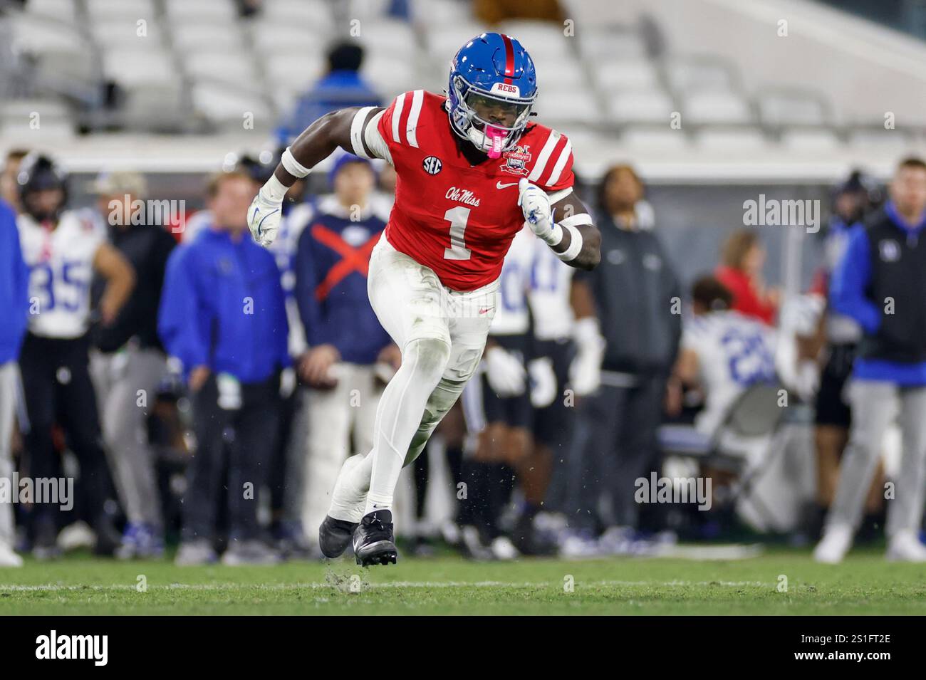 JACKSONVILLE, FL - JANUARY 02: Mississippi Rebels defensive end Princely Umanmielen (1) runs ...