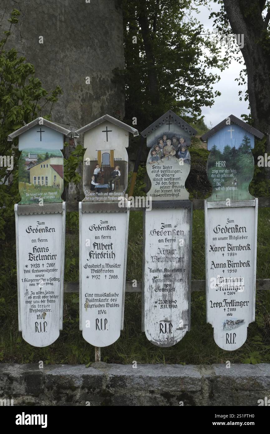 Three death boards by the wayside in memory of the deceased. Portrait ...
