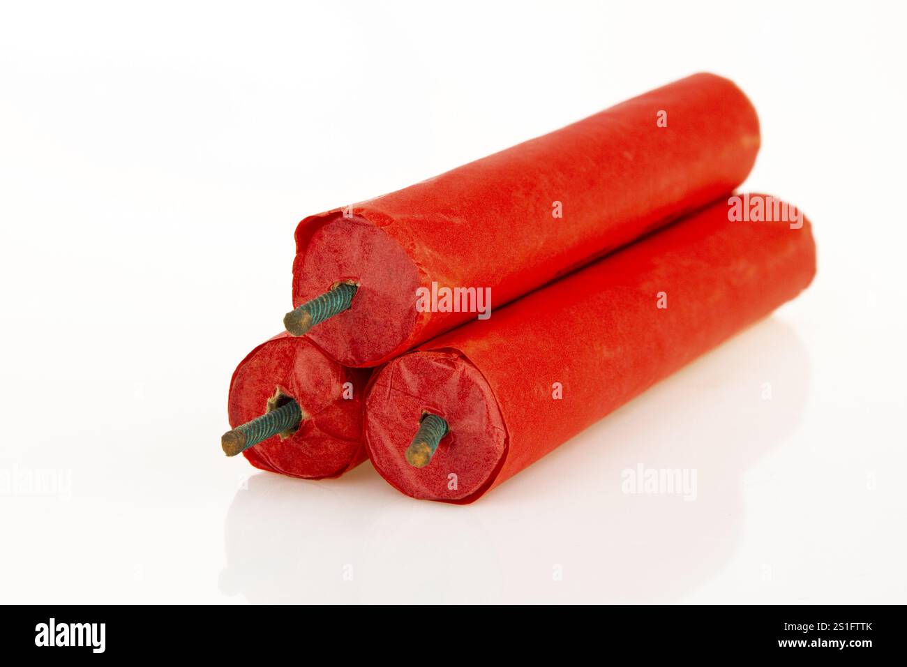 Red firework body on a white background Stock Photo - Alamy