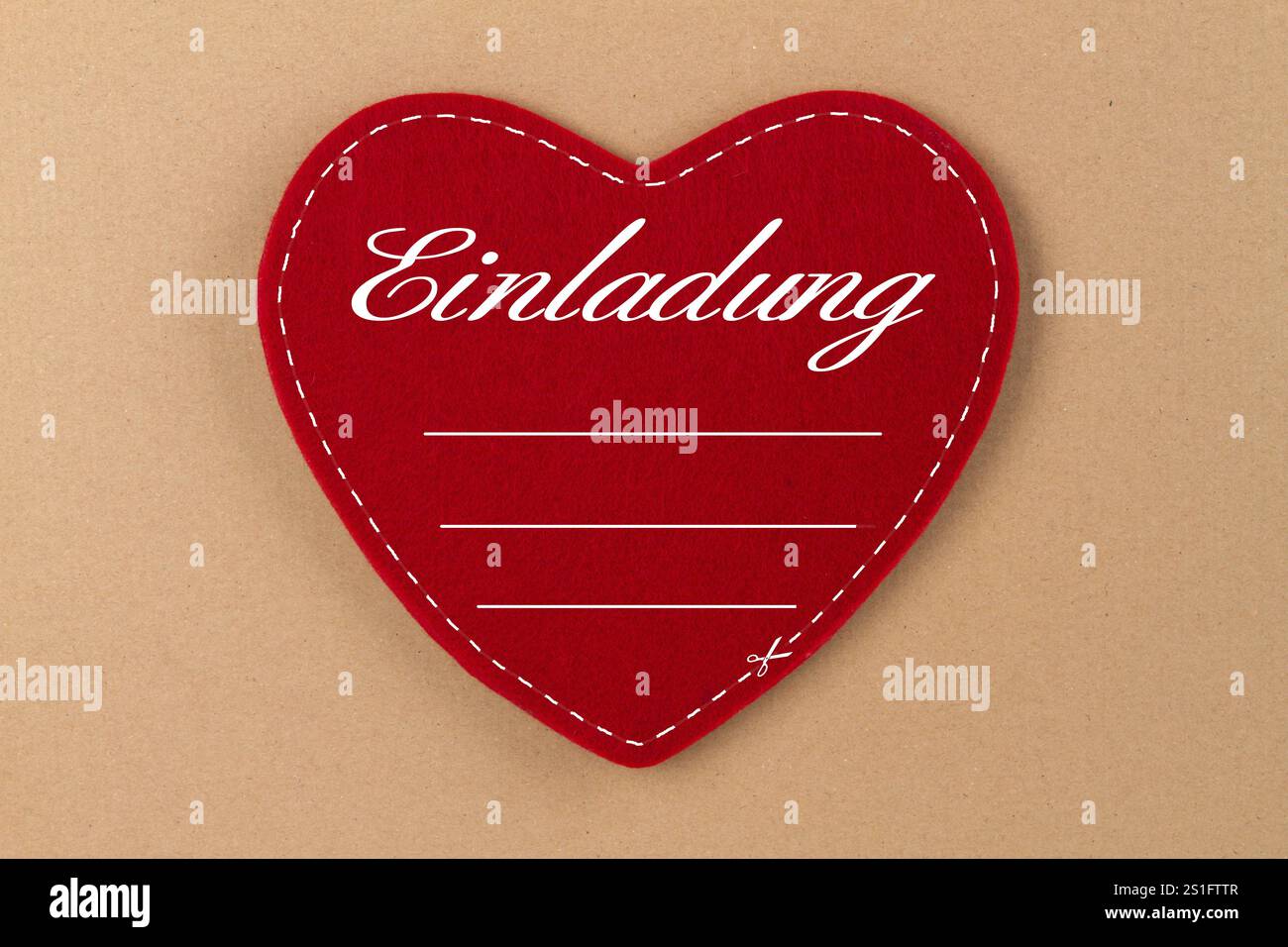Red felt heart with the lettering - Invitation Stock Photo - Alamy