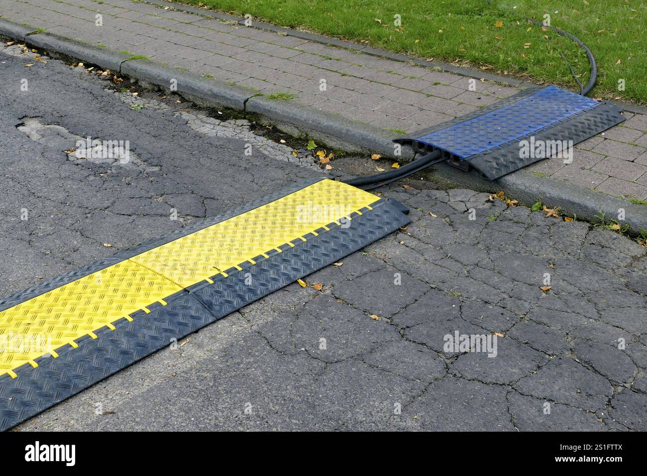 Cable bridge - trip protection with power cable on the floor Stock ...