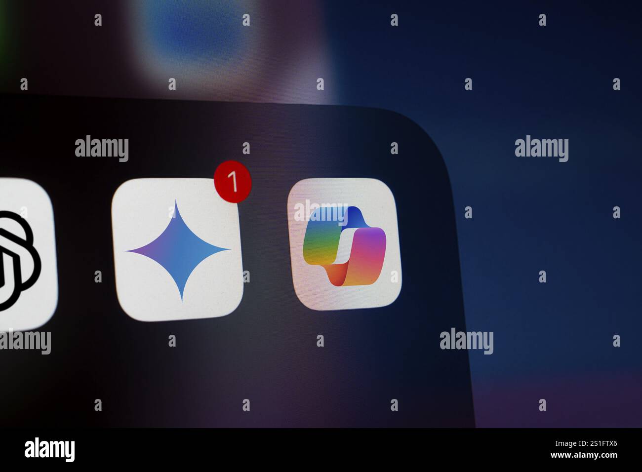 A close up of an iPhone screen displaying the Google Gemini and ...